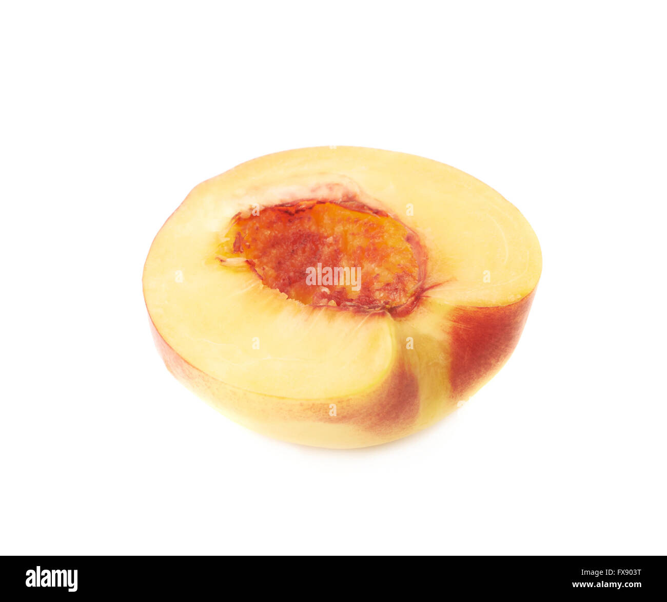 Cut open nectarine half isolated Stock Photo - Alamy