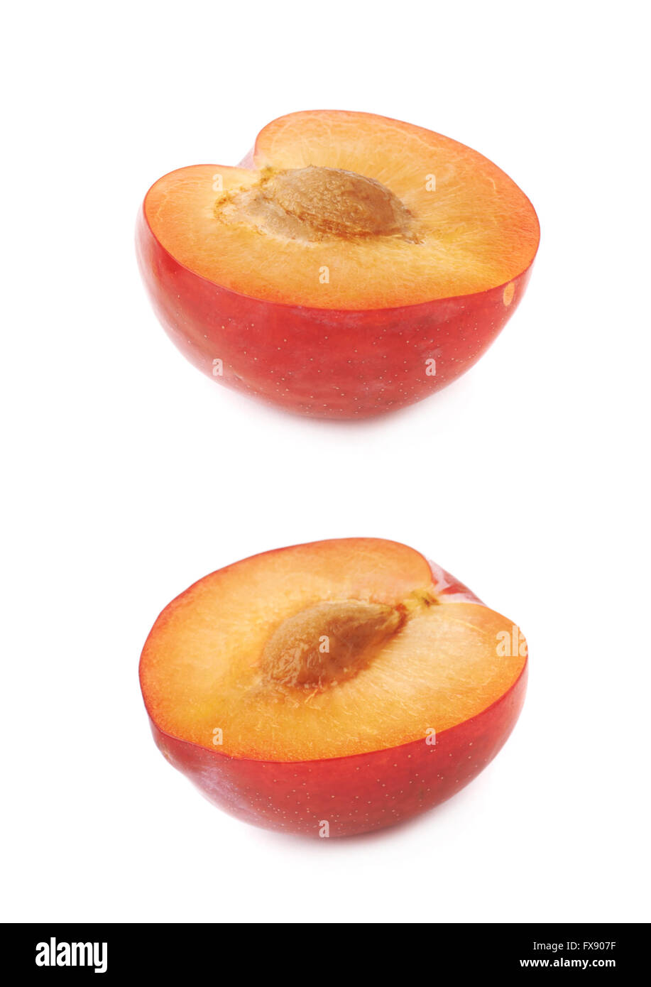 Cut open plum half isolated hi-res stock photography and images - Alamy