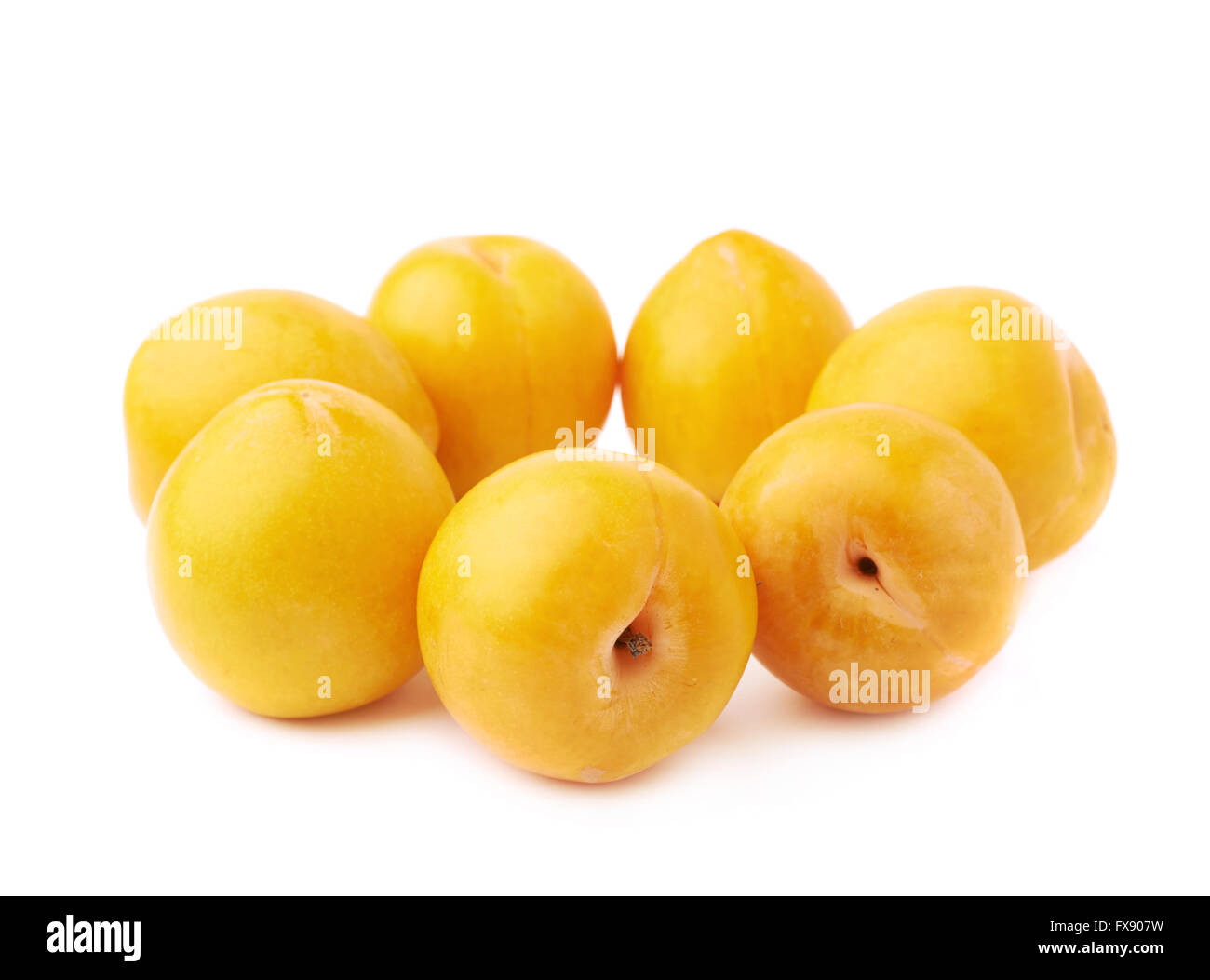 Yellow plums composition isolated Stock Photo - Alamy