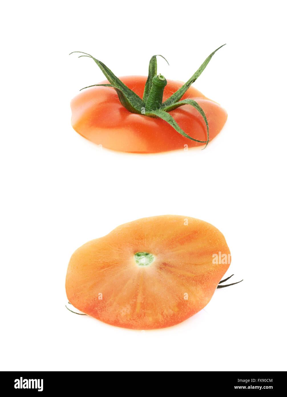 Slice of tomato's top and bottom isolated Stock Photo - Alamy
