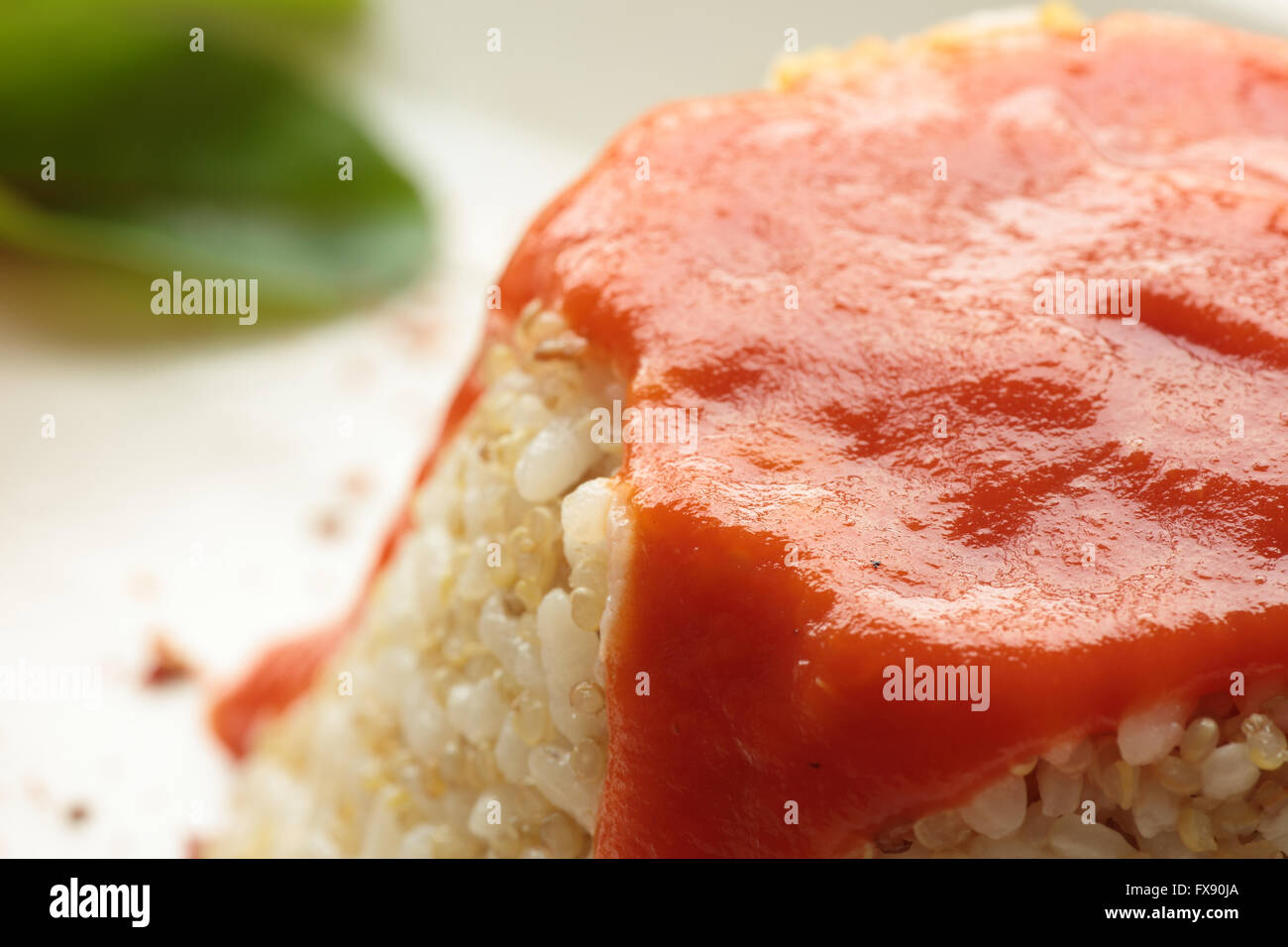 Cuban style rice with fried tomato decorated photographed close Stock ...