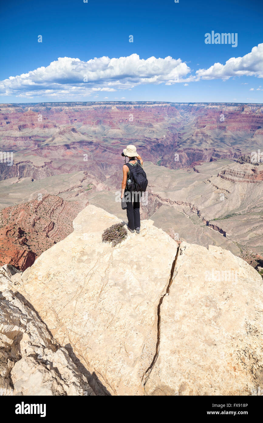 Woman on edge of cliff hi-res stock photography and images - Alamy