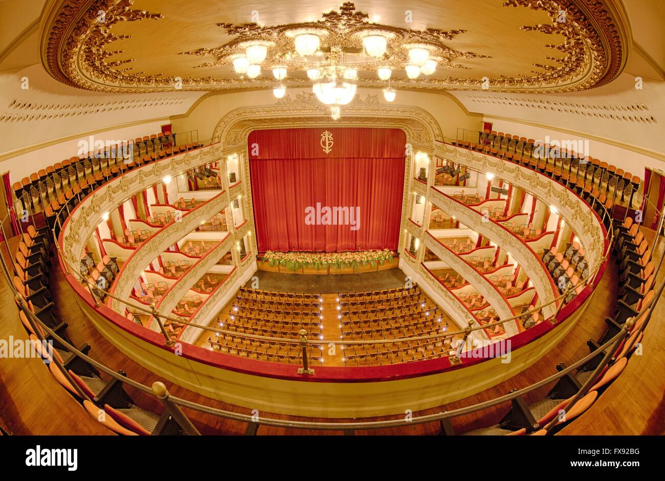 wide angle view of Guimera theatre stage with lowered curtain, stalls ...