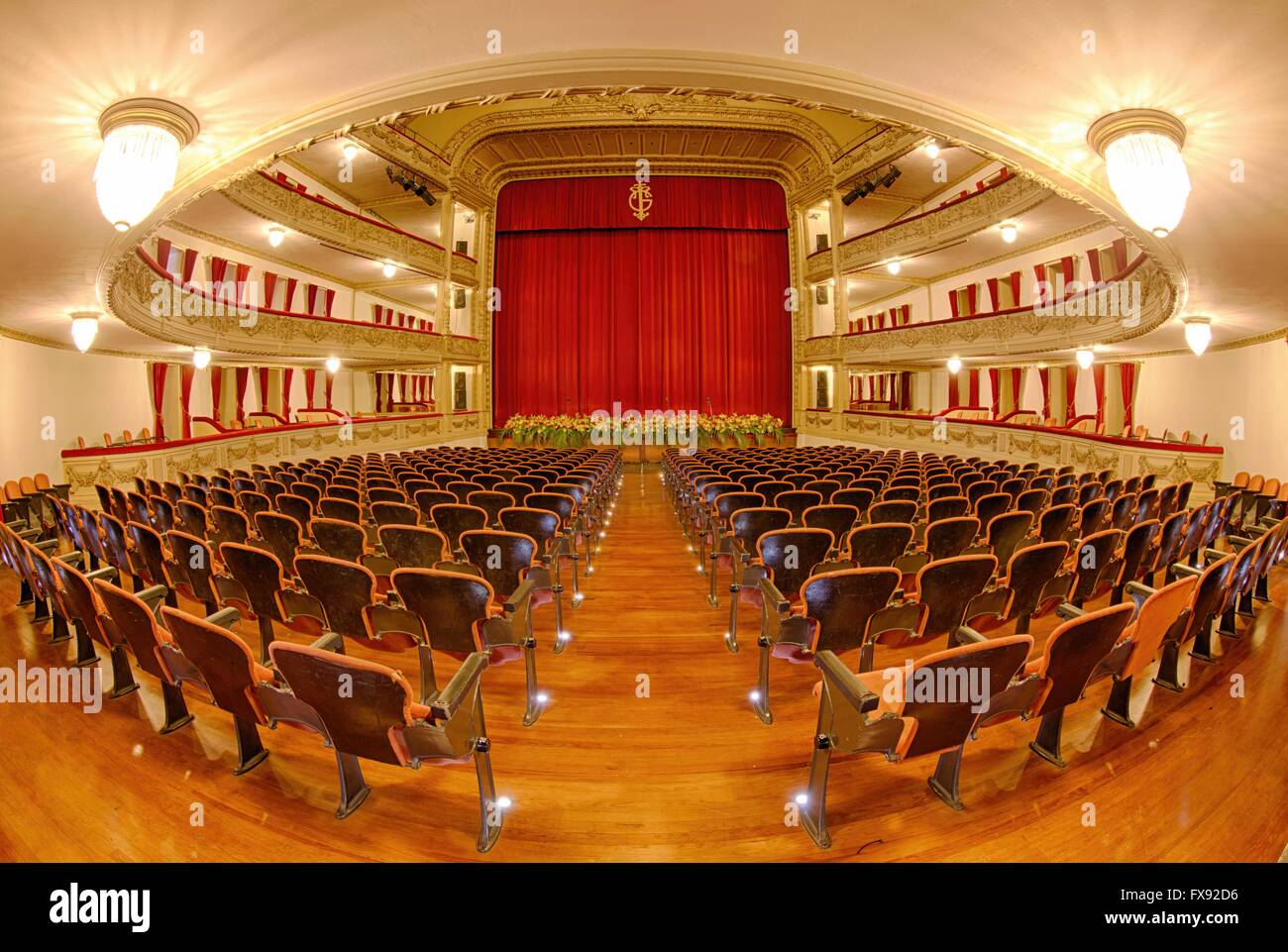 wide angle view of Guimera theatre stage with lowered curtain, stalls ...