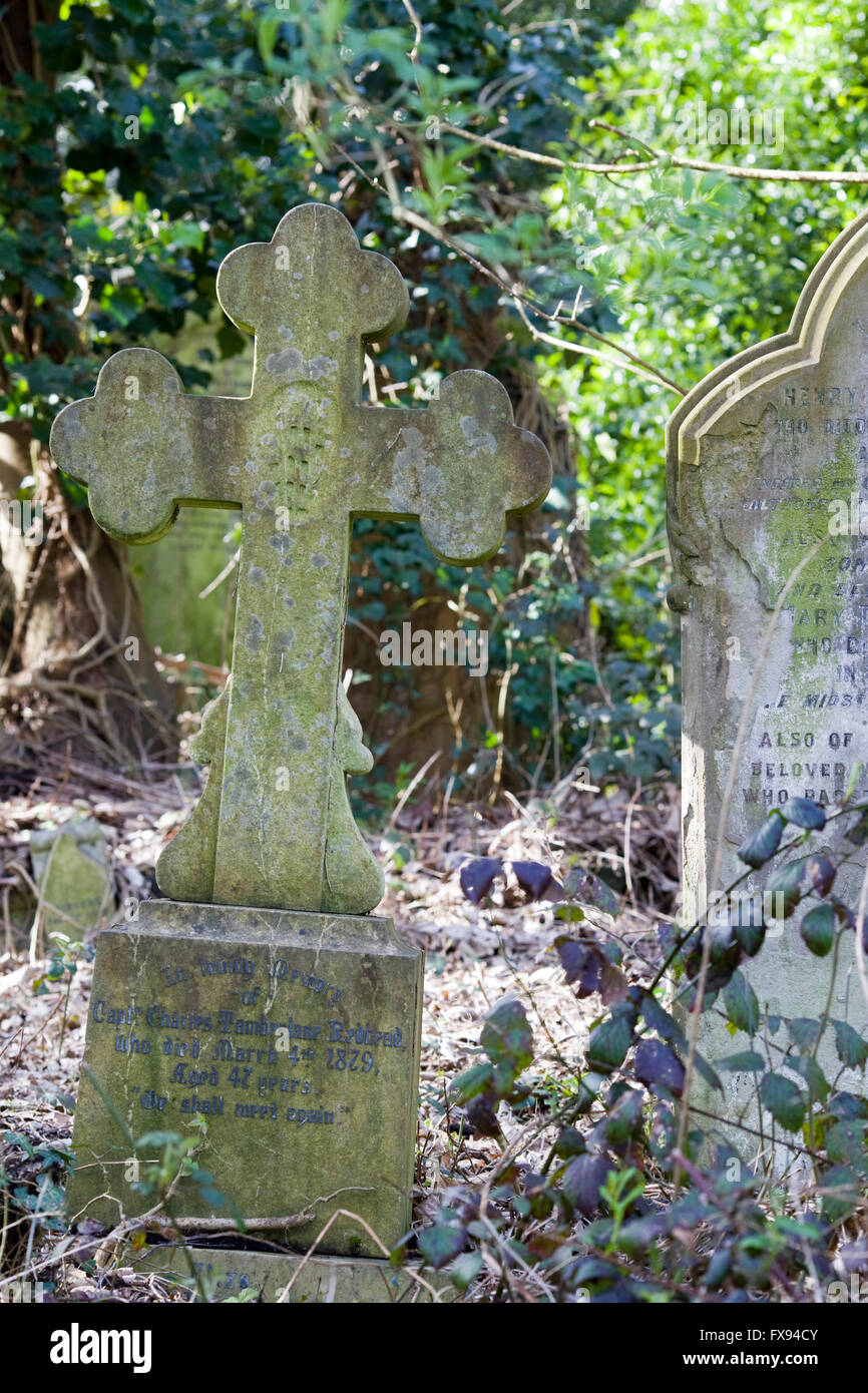 Damaged and fallen old graves and headstones in an Ancient Burial ...