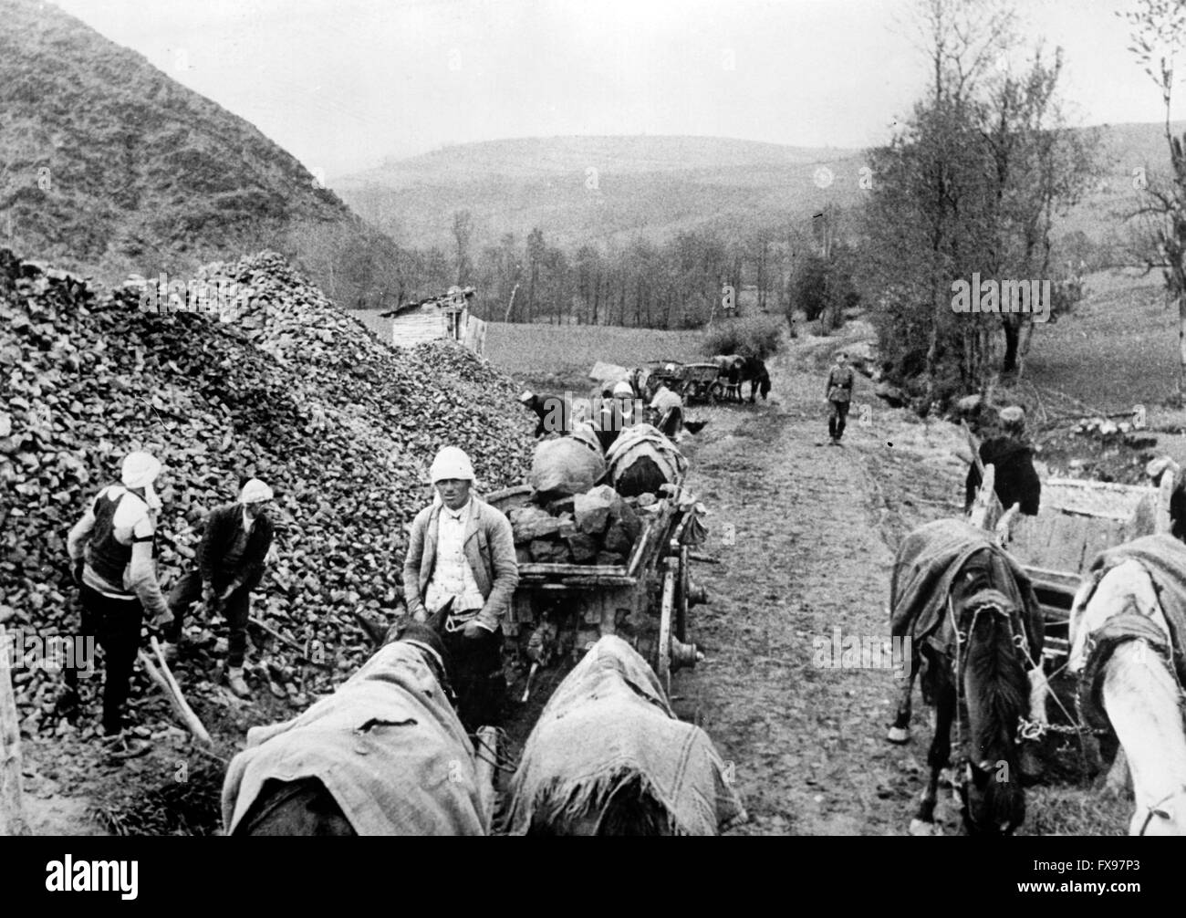 The Nazi propaganda image depicts locals transporting bronze from a ...