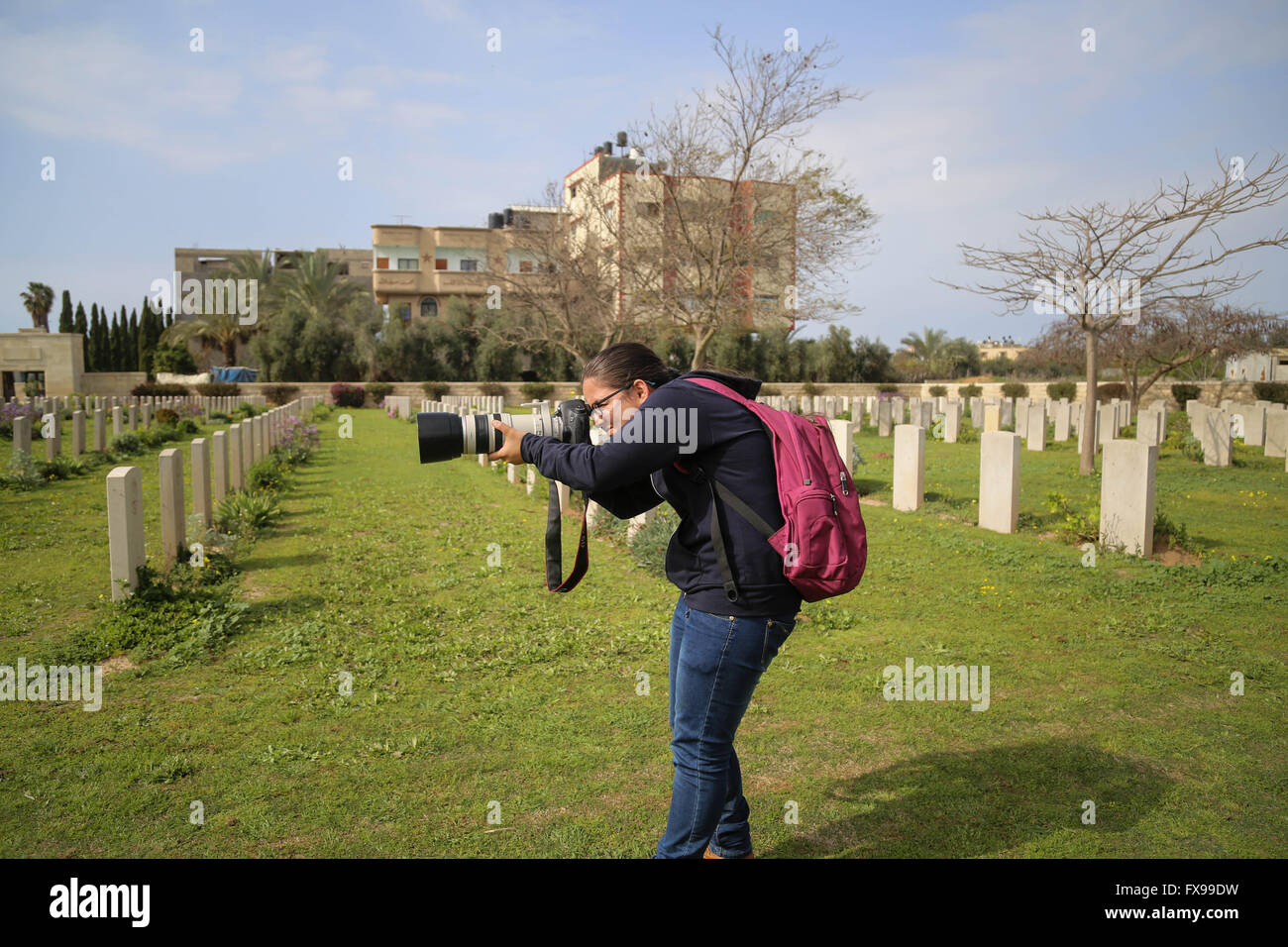 Palestinian photographers during a training session in photography with ...