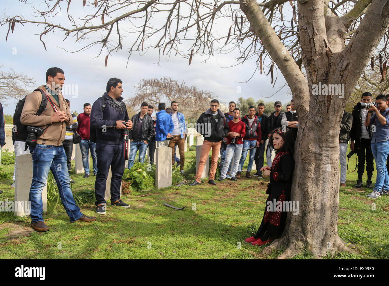 Palestinian photographers during a training session in photography with ...
