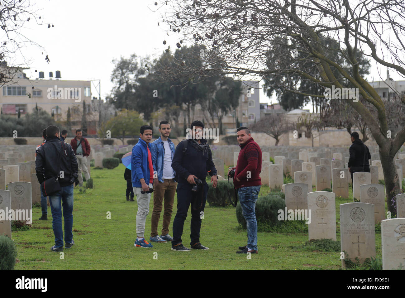 Palestinian photographers during a training session in photography with ...