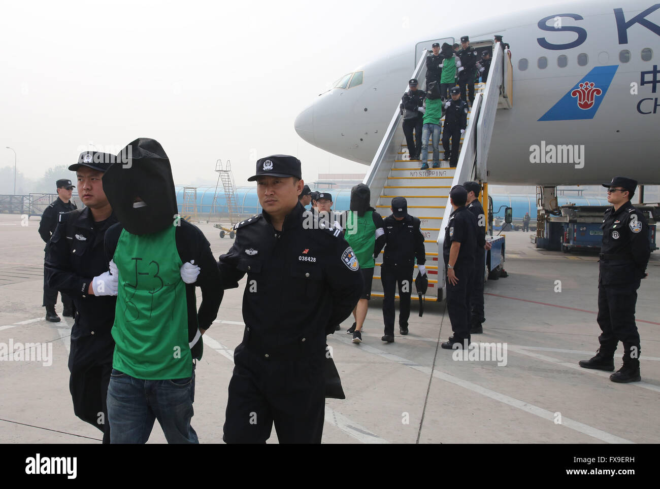 Beijing, China. 13th Apr, 2016. Chinese telecom fraud suspects deported ...