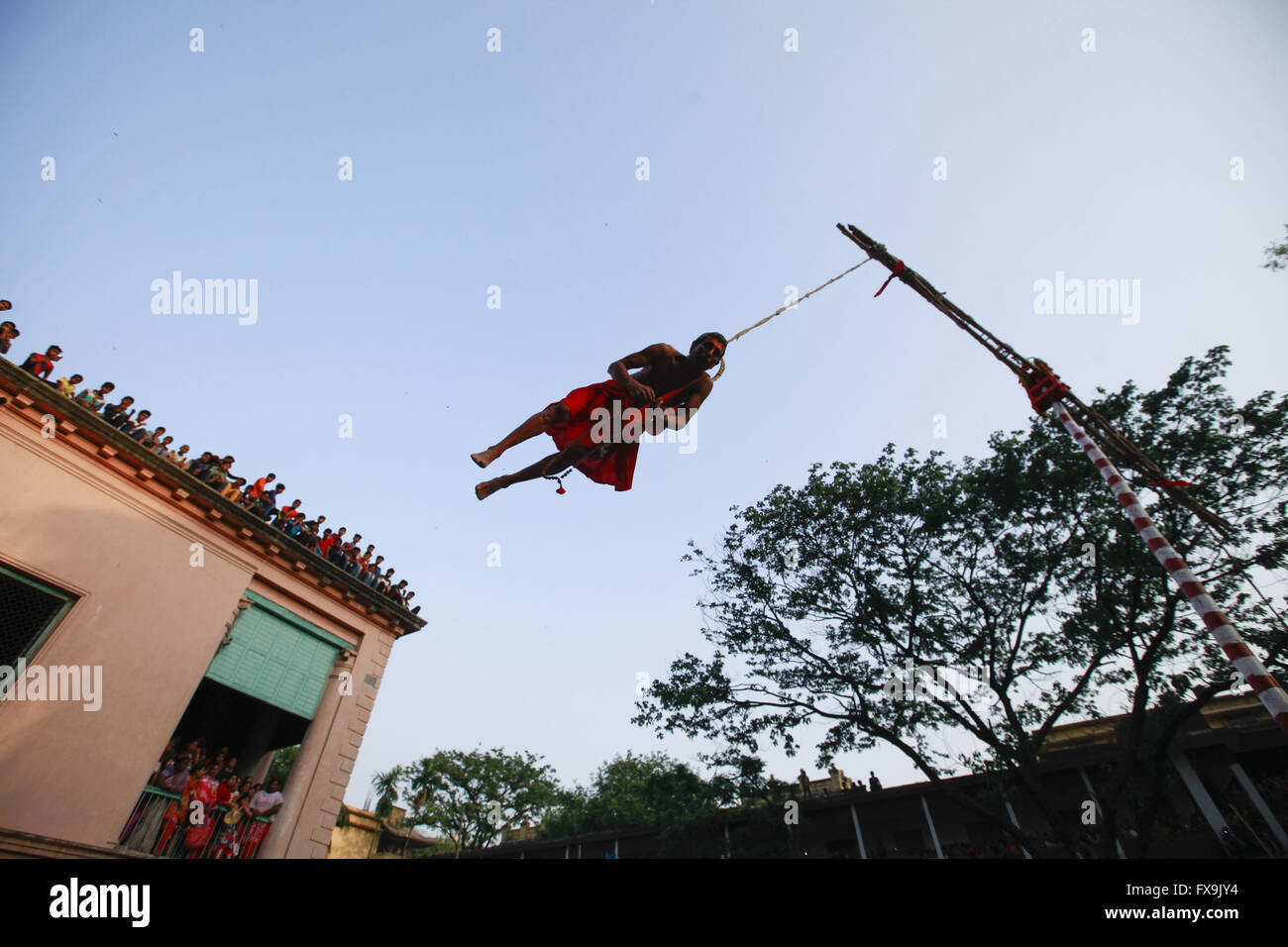 Dhaka, Bangladesh. 13th Apr, 2016. A Bangladeshi Hindu devotee hangs in ...