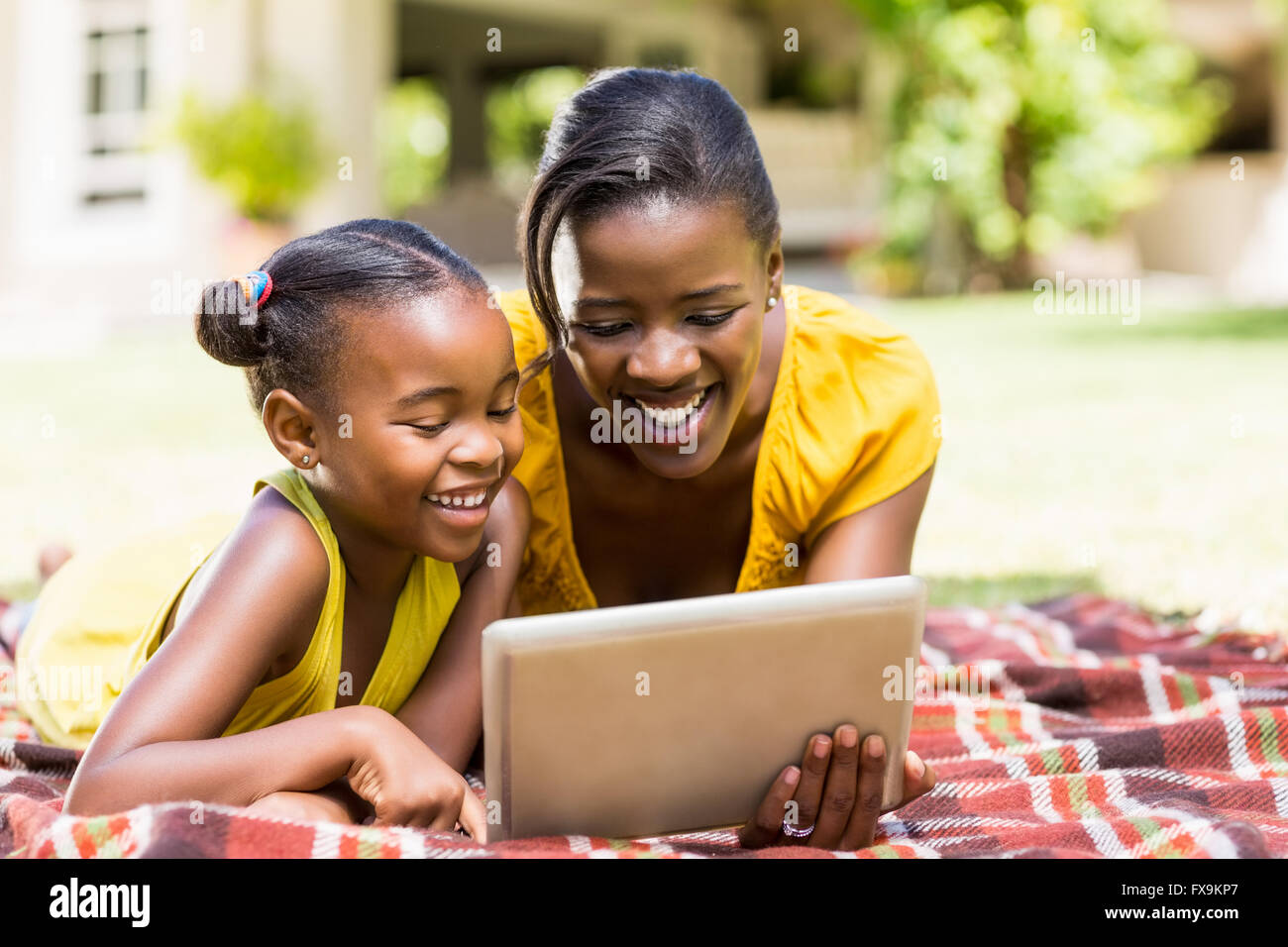 Happy family watching a laptop Stock Photo - Alamy