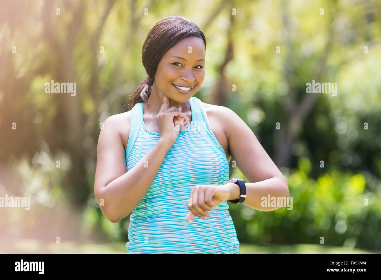 Woman looking at watch hi-res stock photography and images - Alamy