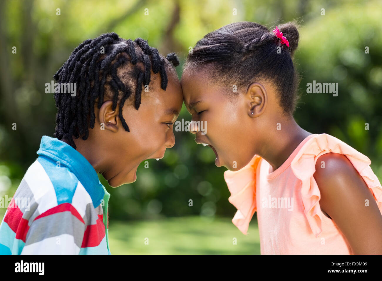 Young children enjoying together Stock Photo - Alamy