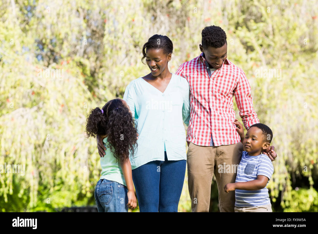 Happy family looking each other Stock Photo - Alamy