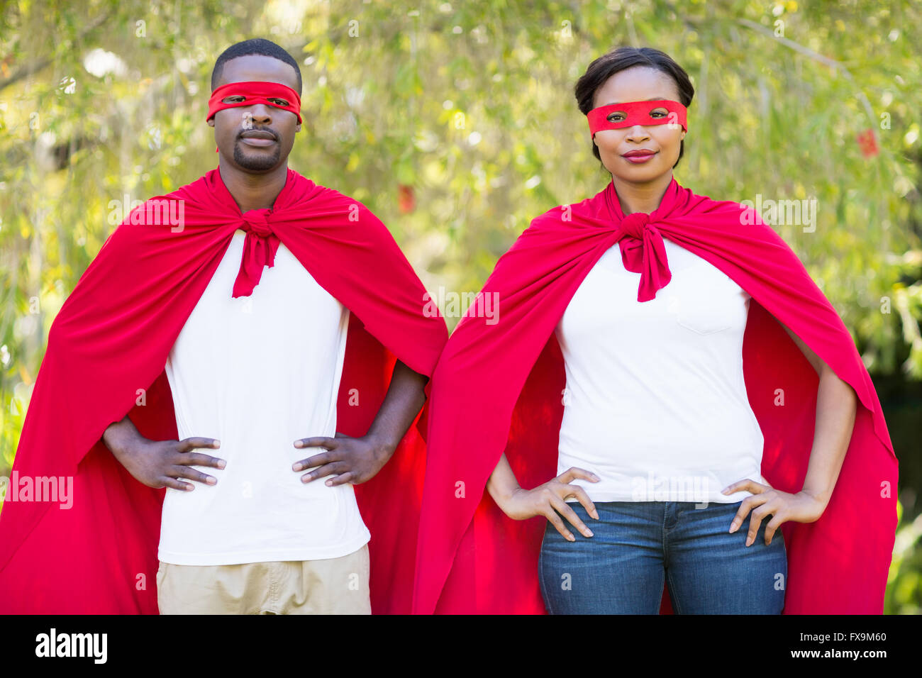 Happy couple dressing up Stock Photo - Alamy