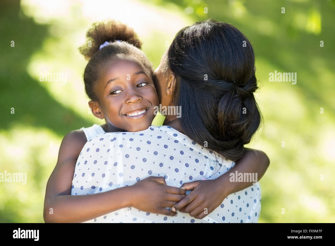 A daughter having hug Stock Photo - Alamy