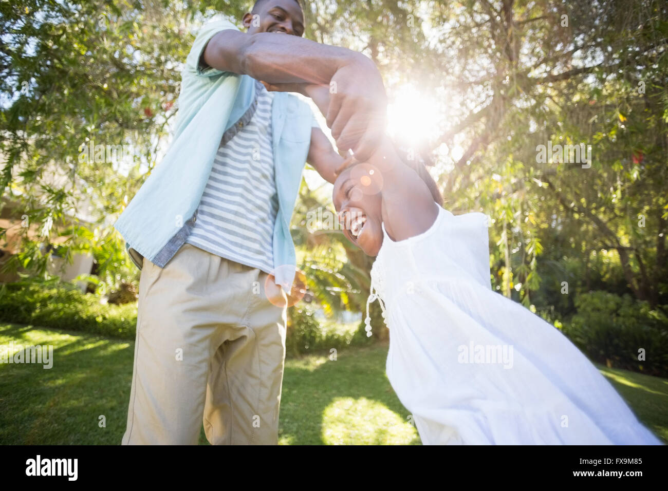 Happy family having fun Stock Photo - Alamy