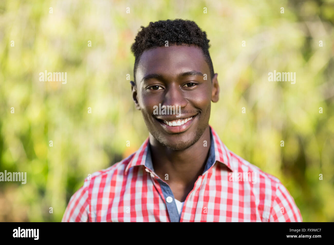 Happy man posing Stock Photo - Alamy