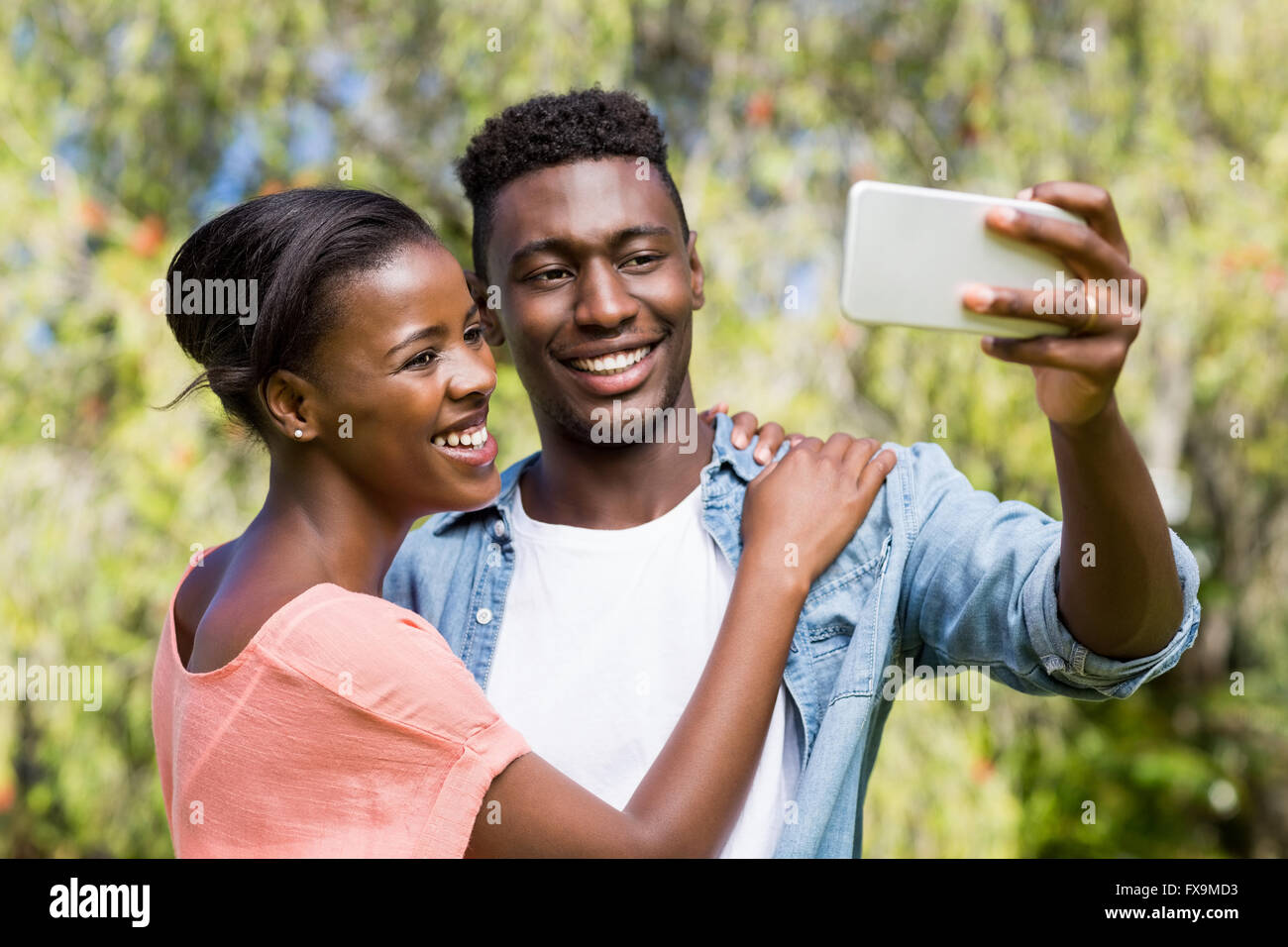 Woman taking family photo hi-res stock photography and images - Alamy