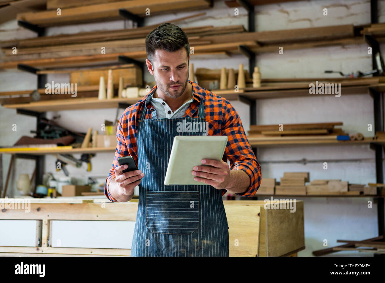 Worker reading manual hi-res stock photography and images - Alamy
