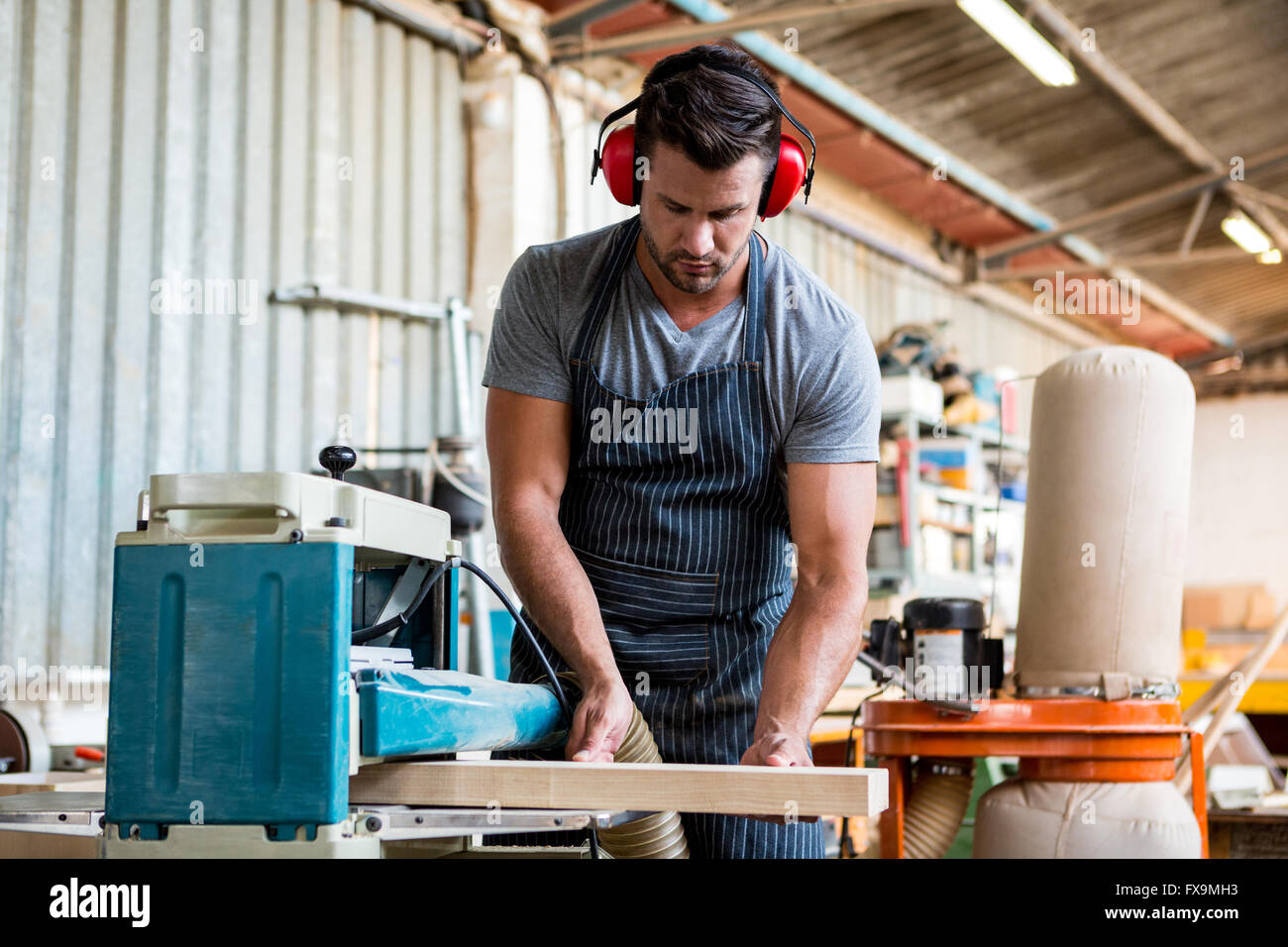 Carpenter working on his craft Stock Photo - Alamy