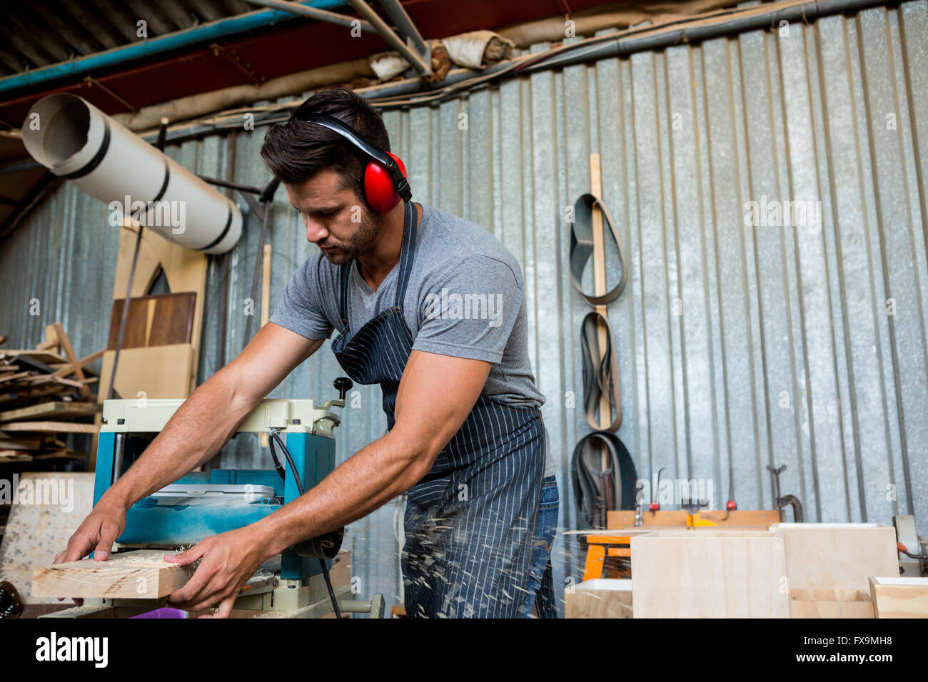 Carpenter working on his craft Stock Photo - Alamy