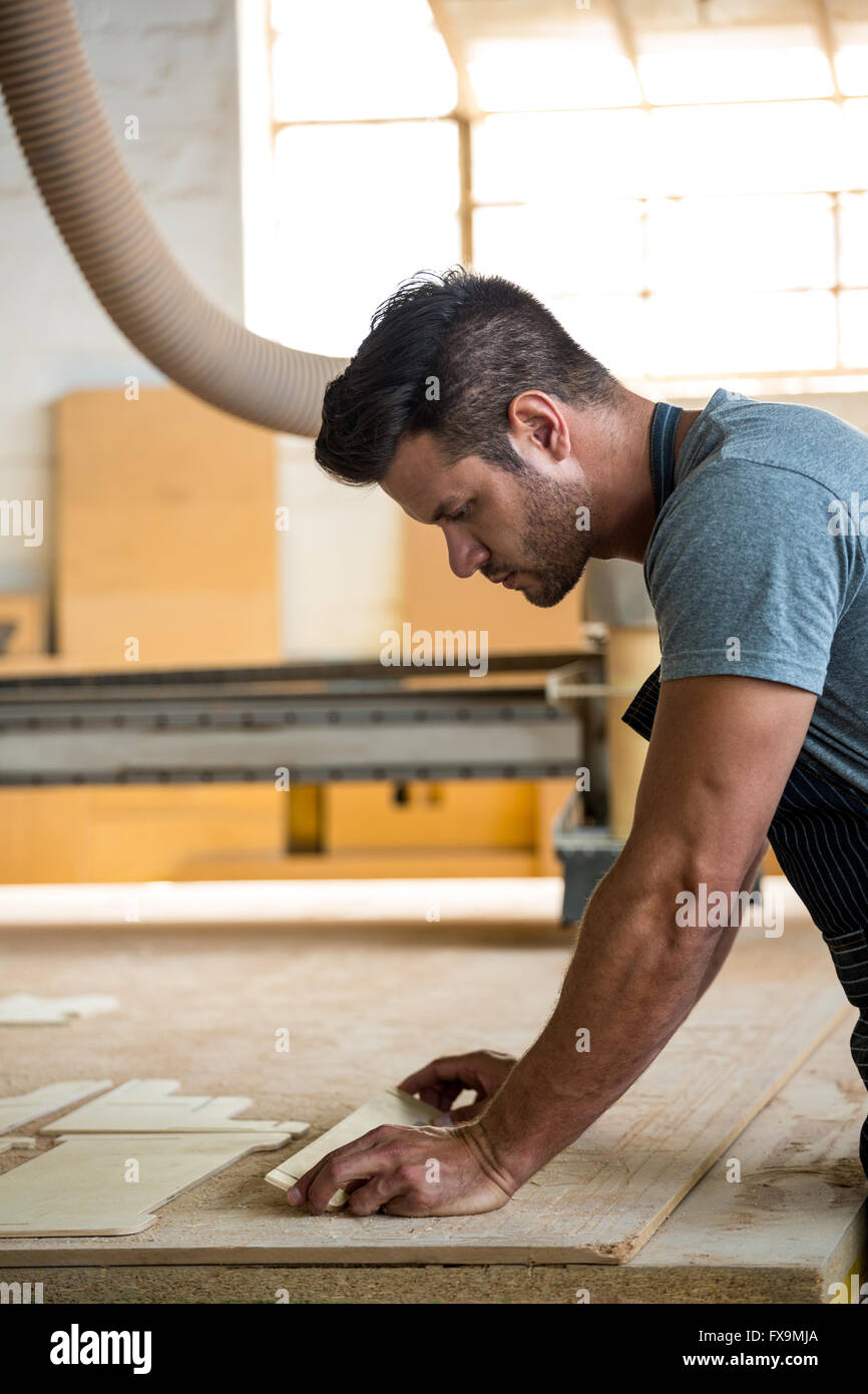 Carpenter working on his craft Stock Photo - Alamy