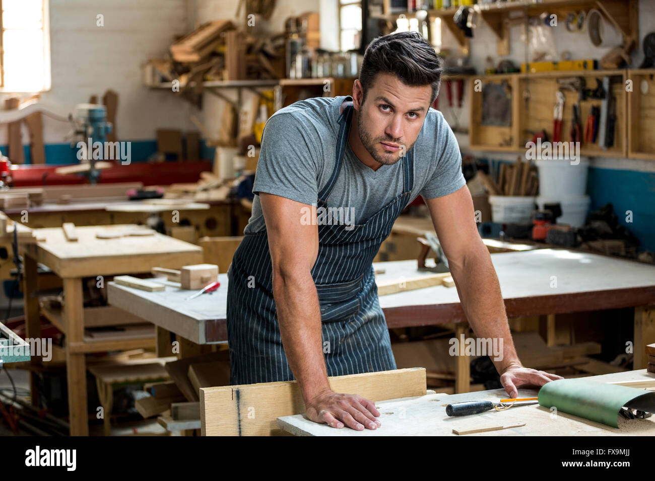 Carpenter is posing Stock Photo - Alamy