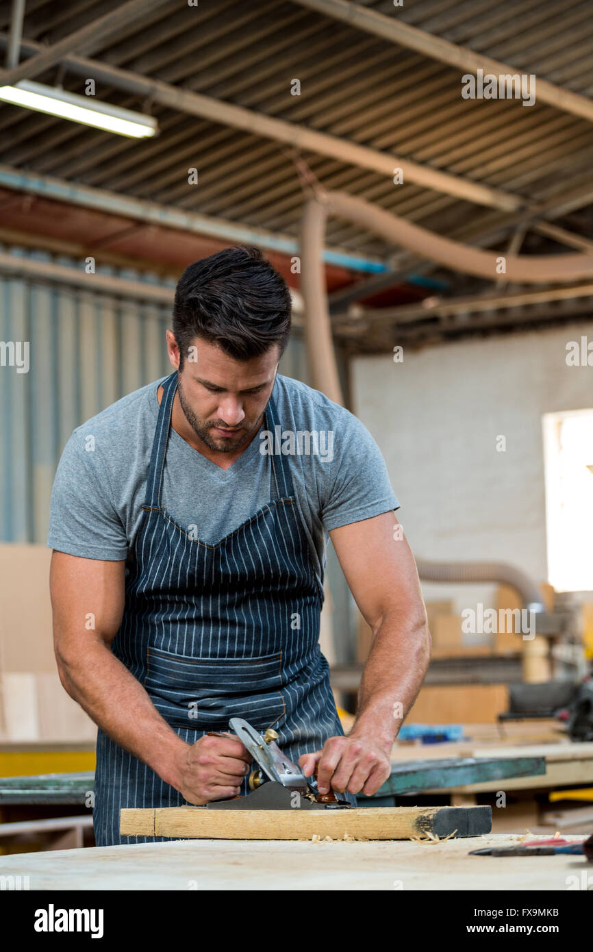 Carpenter working on his craft Stock Photo - Alamy