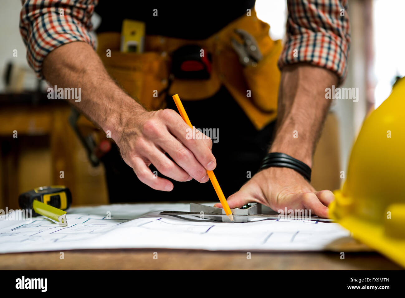 Carpenter working on his craft Stock Photo - Alamy