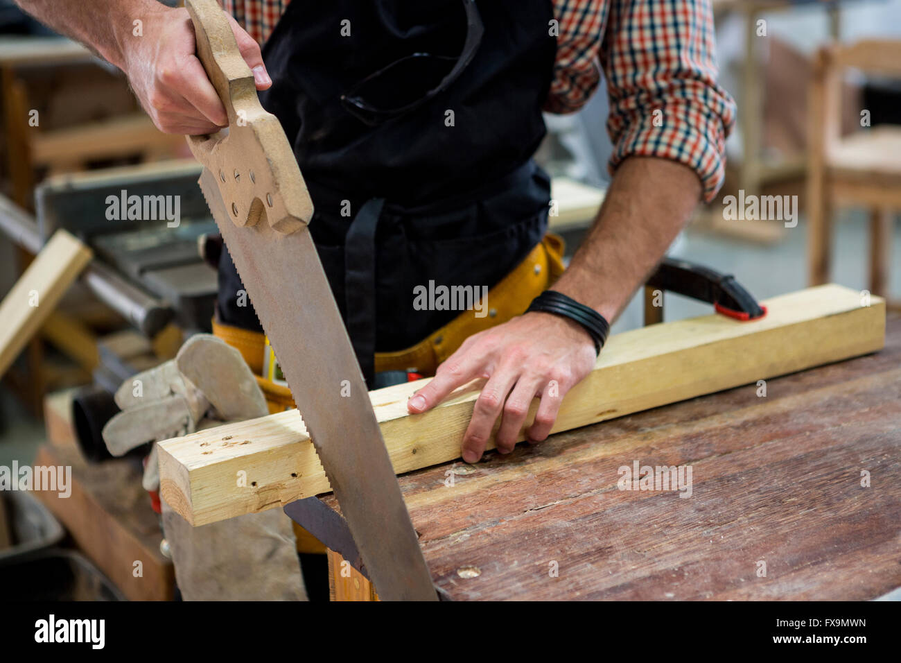 Carpenter working on his craft Stock Photo - Alamy