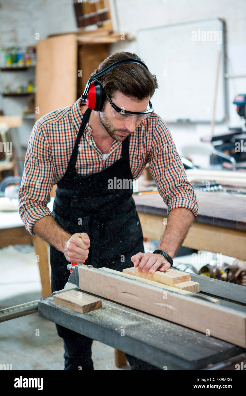 Carpenter working on his craft Stock Photo - Alamy