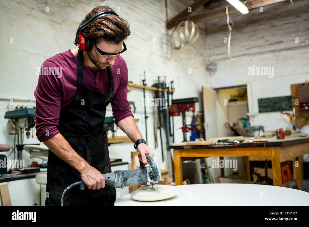 Carpenter working on his craft Stock Photo - Alamy
