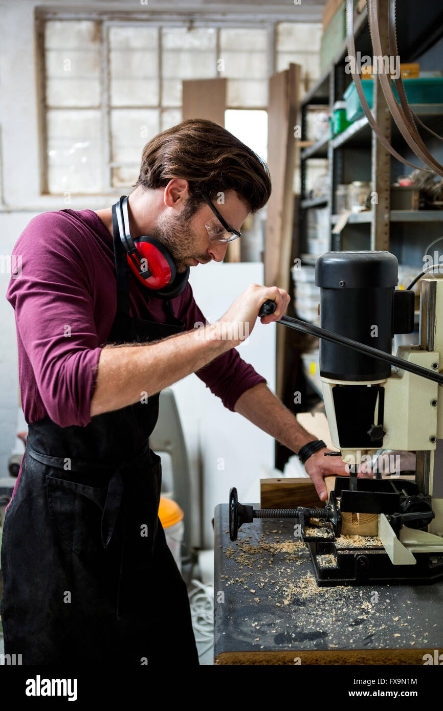 Carpenter working on his craft Stock Photo - Alamy