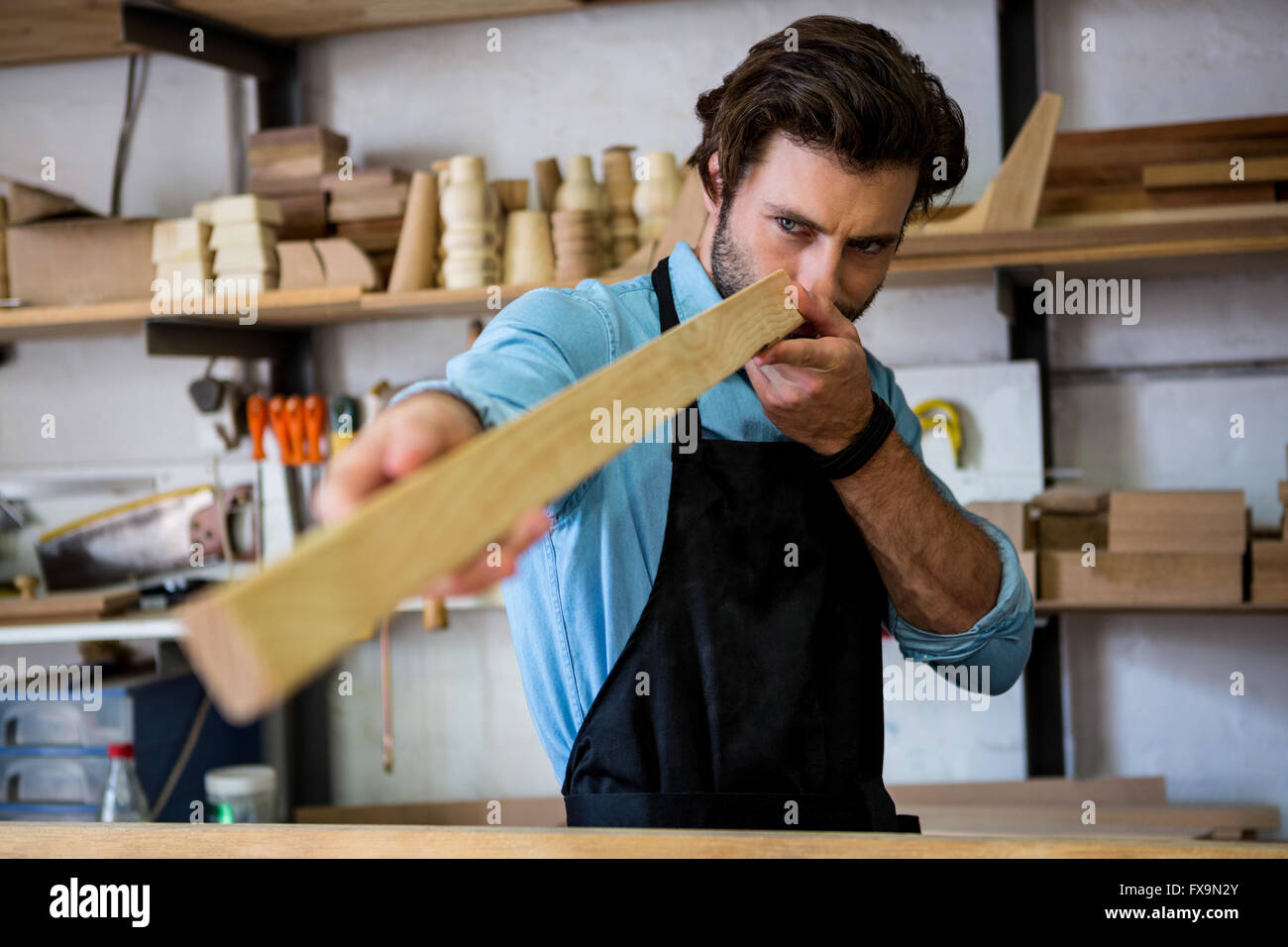 Carpenter working on his craft Stock Photo - Alamy
