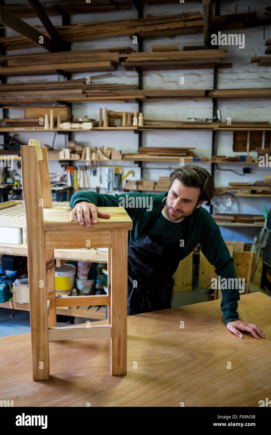 Carpenter working on his craft Stock Photo - Alamy