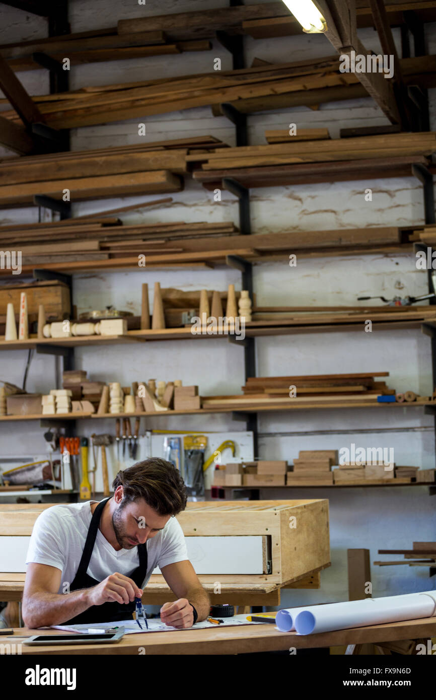Carpenter working on his craft Stock Photo - Alamy