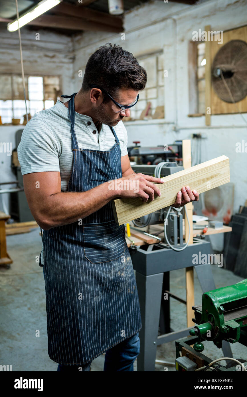 Carpenter working on his craft Stock Photo - Alamy