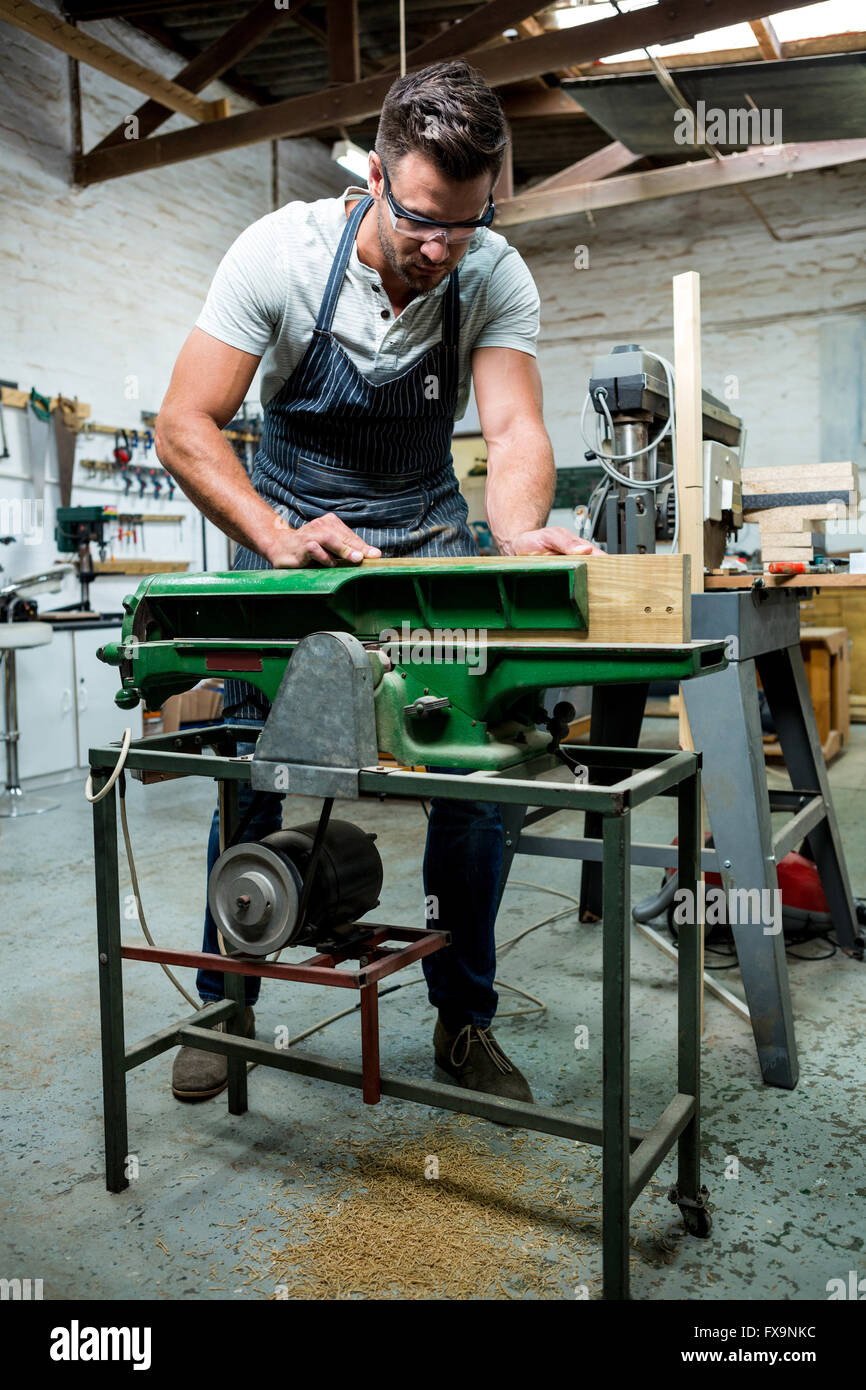 Carpenter working on his craft Stock Photo - Alamy
