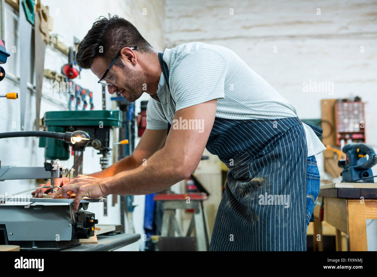 Carpenter working on his craft Stock Photo - Alamy