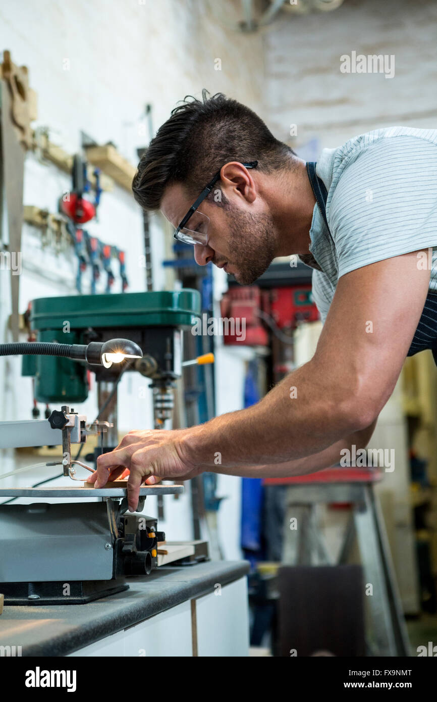 Portrait of a carpenter working on his craft Stock Photo - Alamy