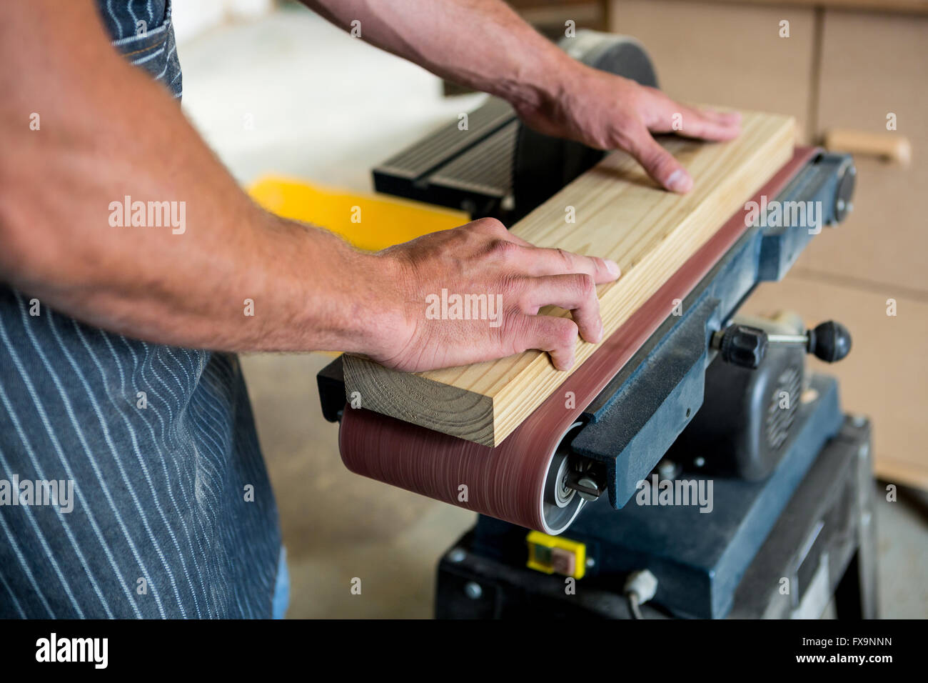 Carpenter working on his craft Stock Photo - Alamy