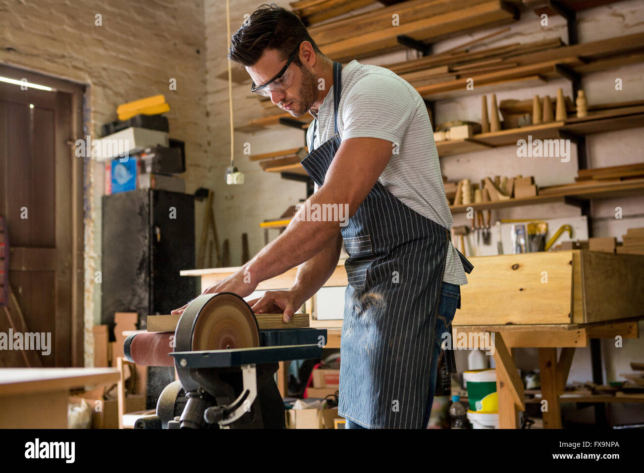 Carpenter working on his craft Stock Photo - Alamy