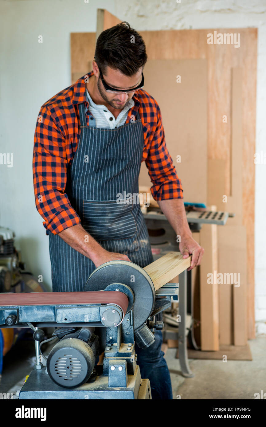Carpenter working on his craft Stock Photo - Alamy