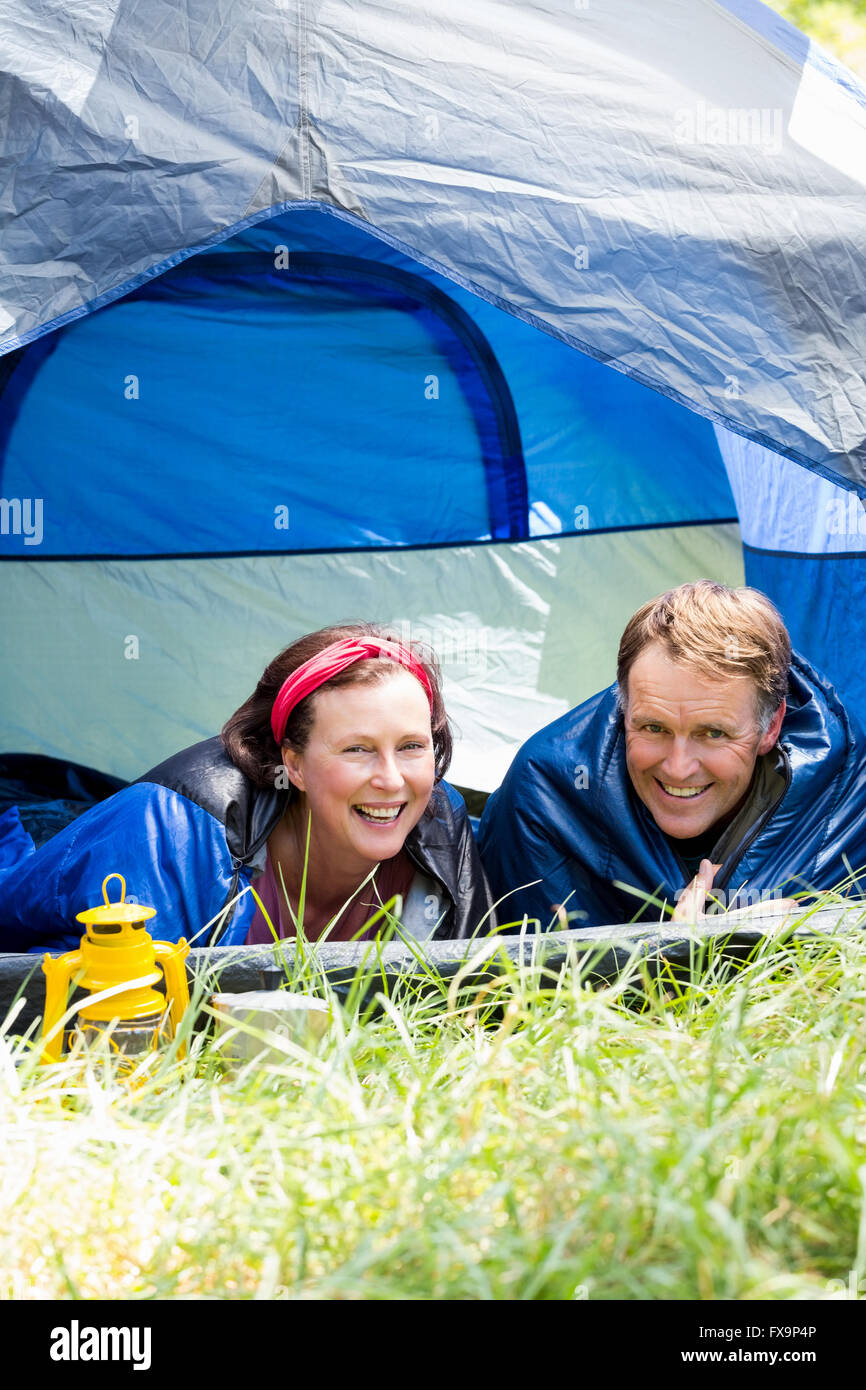senior couple smiling inside their tent Stock Photo - Alamy