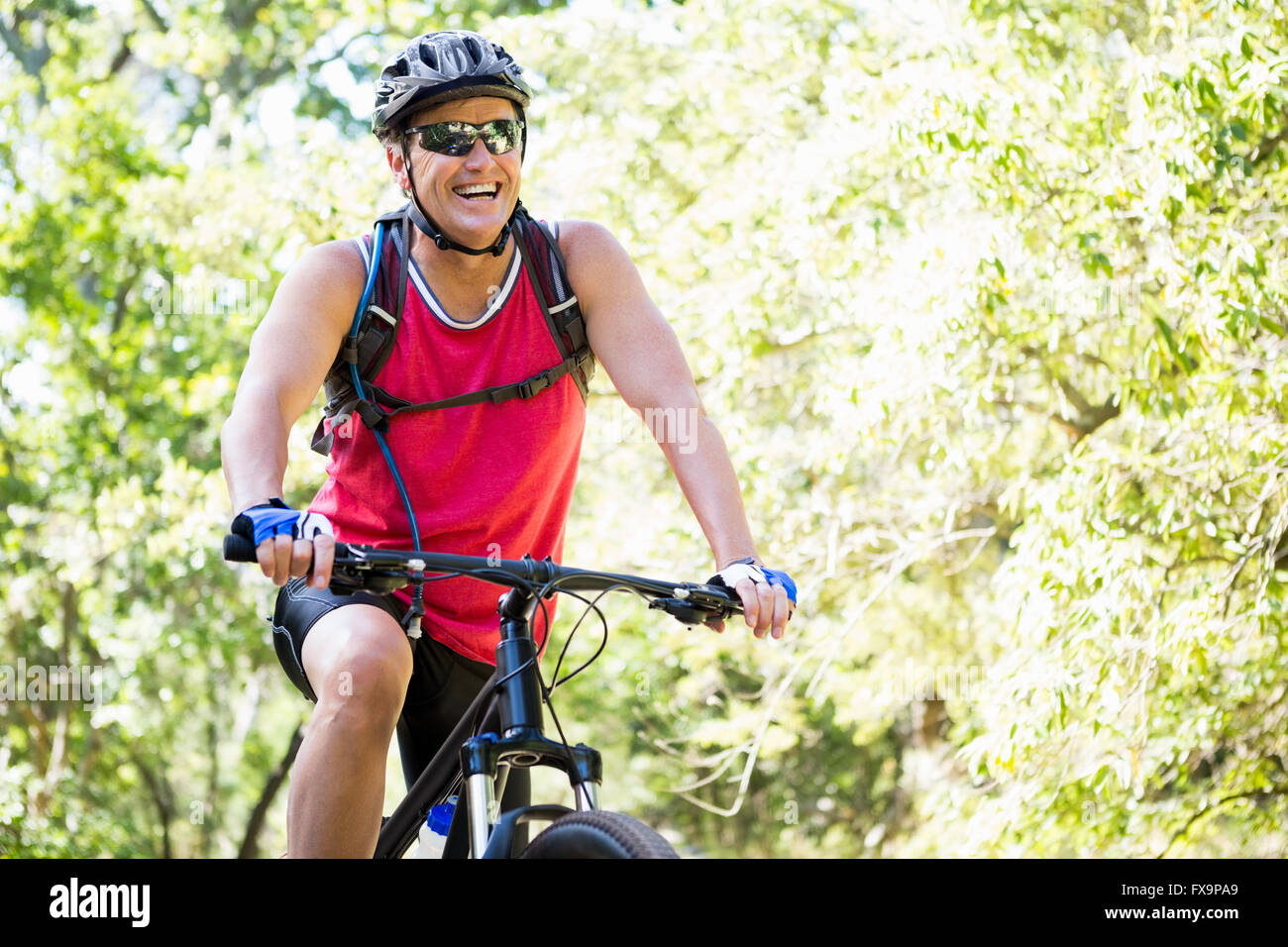 Man riding bike hi-res stock photography and images - Alamy
