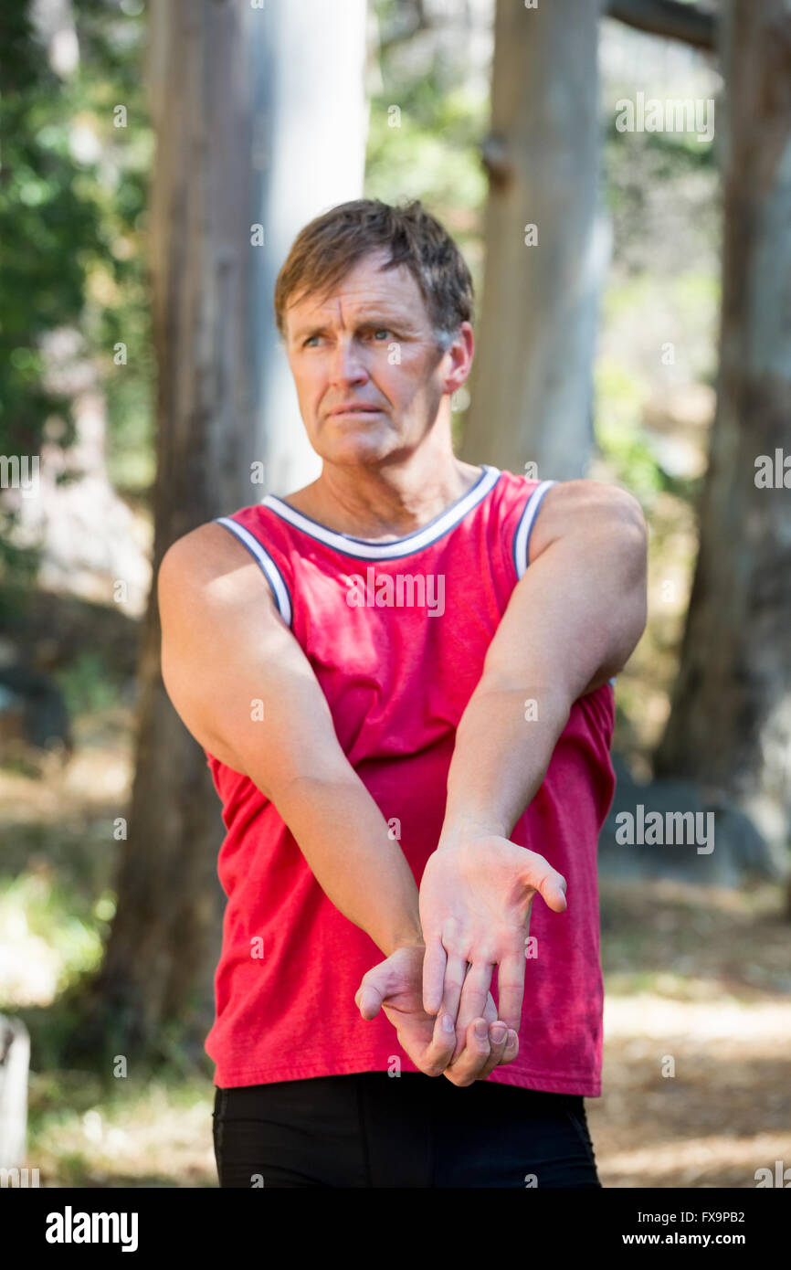 Man stretching his arms Stock Photo - Alamy