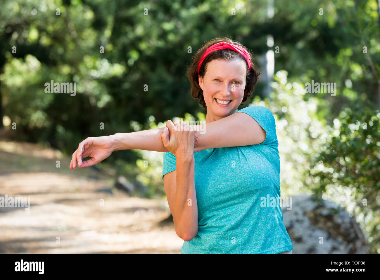 Woman stretching her arms Stock Photo - Alamy