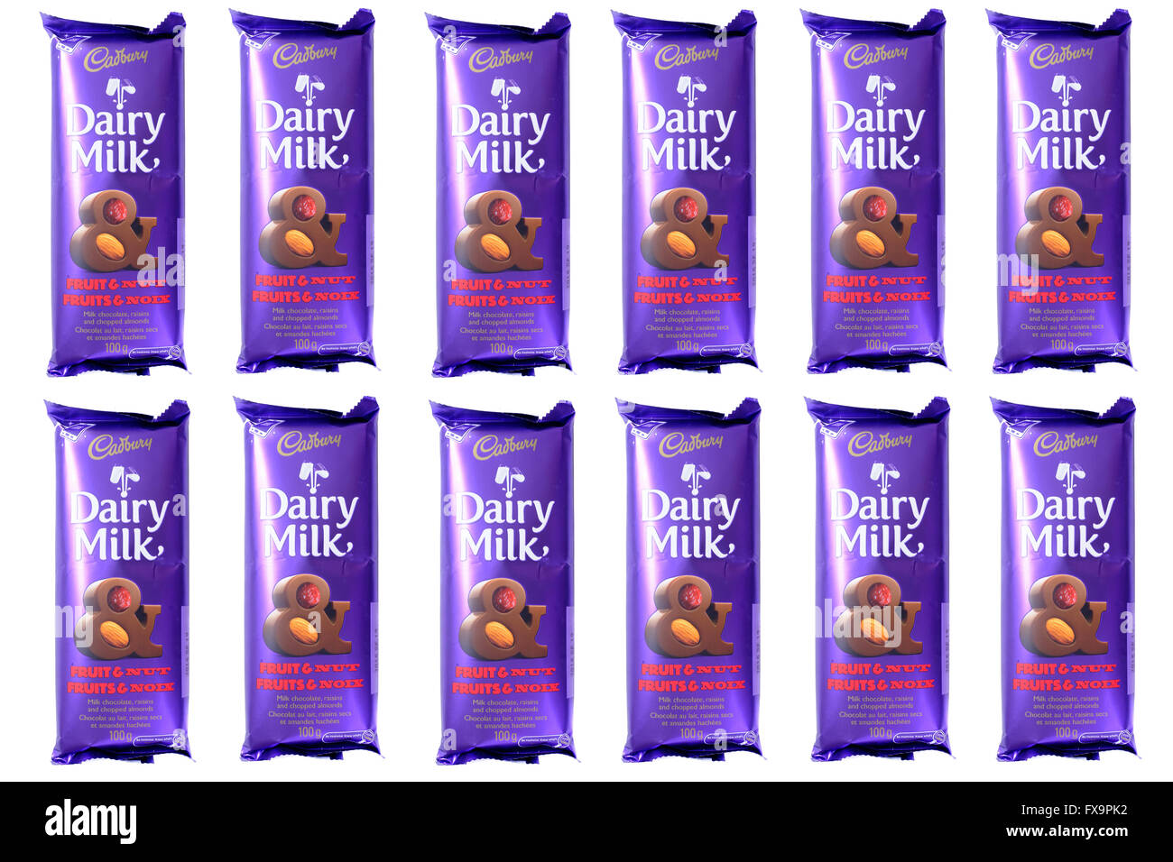 Rows of Cadbury chocolate bars photographed against a white background ...